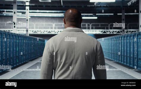 System Administrator In Data Center Doing Inspection On Infrastructure