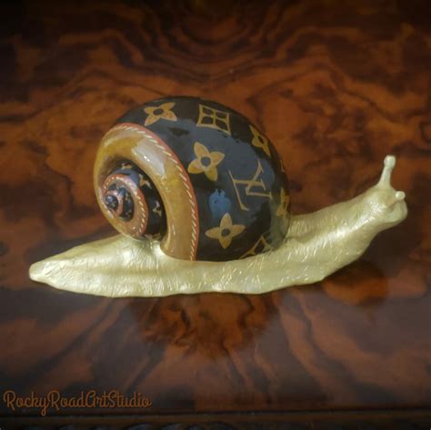 Natures Canvas Lisa Orlans Stunning Snail Shells Adorned With