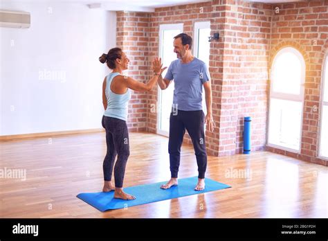 Middle Age Beautiful Sporty Couple Smiling Happy Standing With Smile