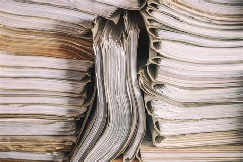 Premium Photo Stacks Of Old Folders With Documents In Archive Closeup