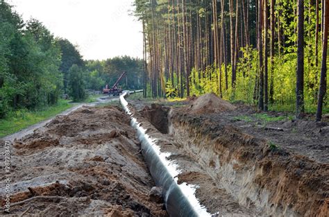 Natural Gas Pipeline Construction Work A Dug Trench In The Ground For The Installation And