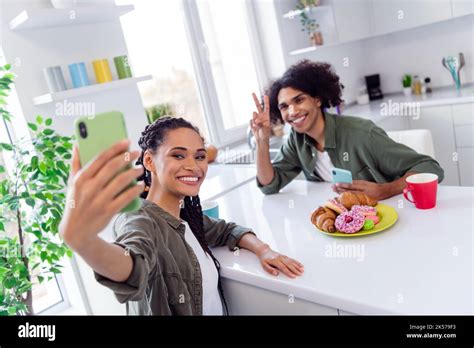 Photo Of Good Mood Brother And Sister Make Selfie Together Eating Yummy