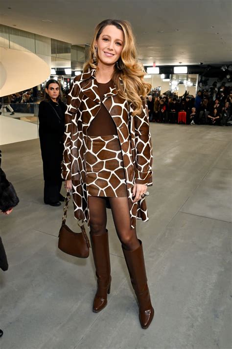 Blake Lively Wore A Giraffe Print Mini Skirt And Trench Coat To Sit