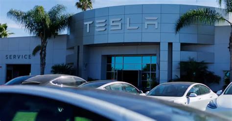 Elon Musks Tesla Settles Lawsuit Amid Racial Harassment Claims By