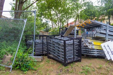 Scaffolding Poles And Brackets Stacked In A Yard Japanese Frame