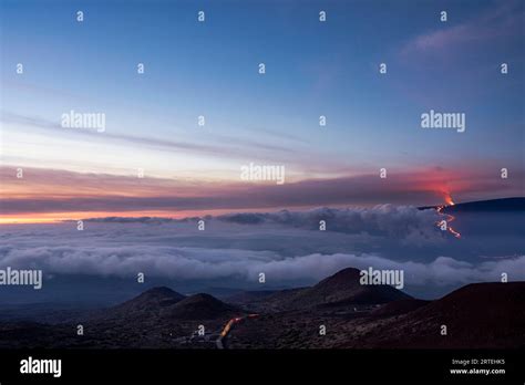 Spectacular View From Above The Clouds Of The Eruption And Lava