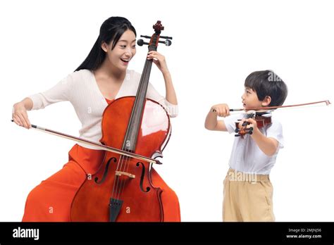 The Female Teacher Guide The Babe Playing Musical Instruments Stock Photo Alamy
