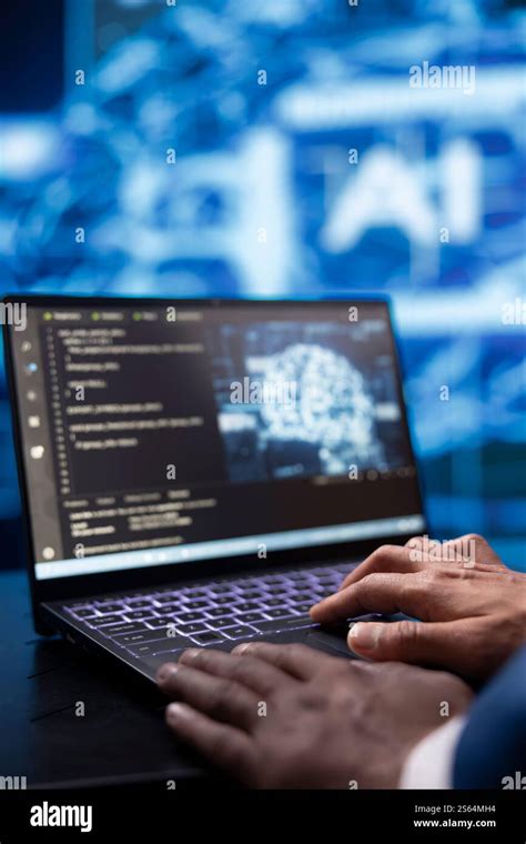System Administrator Analyzing Complex Ai Brain Models On Laptop Close Up Shot Of Worker Using