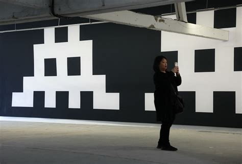 French Street Artist Invader Debuts New Work During Paris Olympics