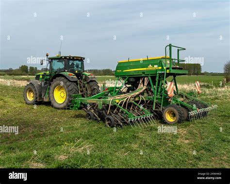 Large Green John Deere 620r Tractor Pulling John Deere 750 Single Disk