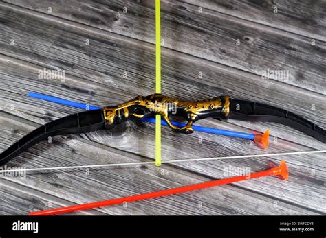 A Plastic Toy Of A Bow And Arrows Archery The Bow And Arrow Is A Ranged Weapon System