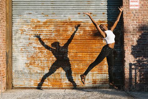 Playful Happy Woman In The City Del Colaborador De Stocksy Simone