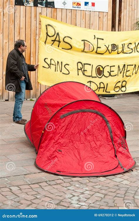 People With Banner During The Demonstration Against Misery And Poverty
