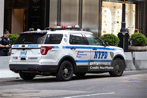 Nypd Car As Seen On 5th Avenue Near Trump Tower Parked And Moving