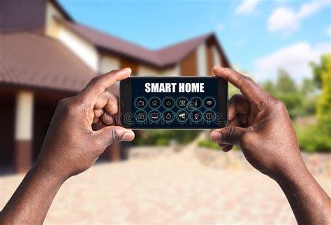 Man Using Phone Application For Controlling Smart Home Closeup Stock Image Image Of Modern