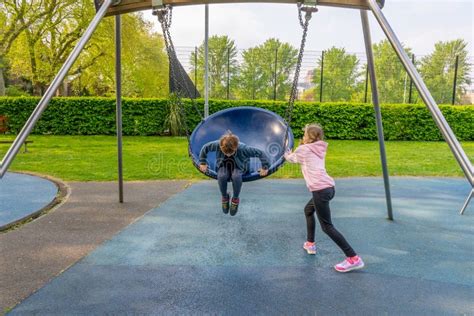 Happy Brother And Sister Having Fun On Playground Outdoors Modern