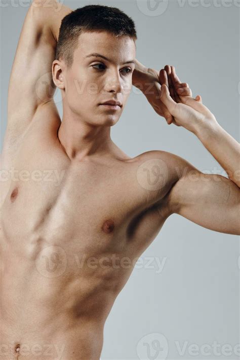 Athletic Physique Young Male Nude Torso Gray Background Portrait