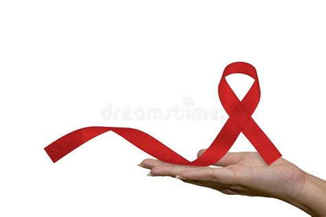 Healthcare And Medical Female Hand Holding Red Aids Awareness Ribbon