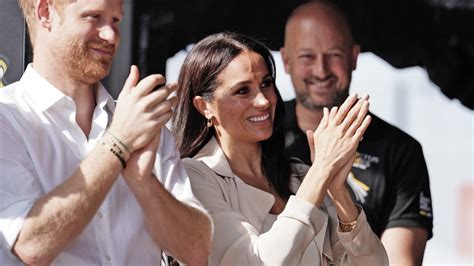 Meghan Markle Wore A Thing Cuyana Silk Trench Edition