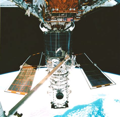 Space In Images 2003 07 An Eva During Sts 82 A Servicing Mission