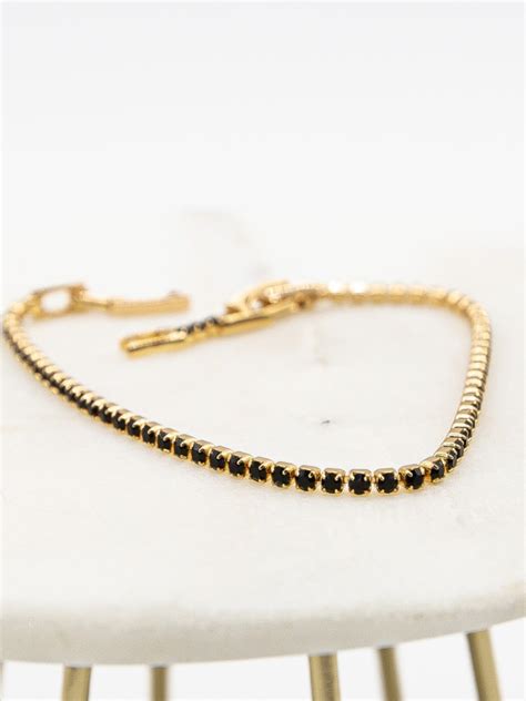 Bratara Tenis Neagra Noua Colecție Este Aici