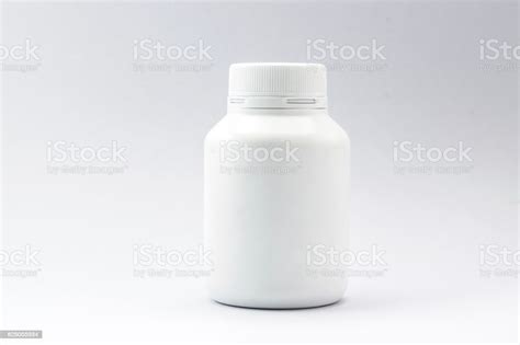 塑膠瓶白色和白色背景上的藥物使用壁紙包工作照片和孤立的圖像 照片檔及更多 人造物件 照片 人造物件 健康的生活方式 具有特定質地