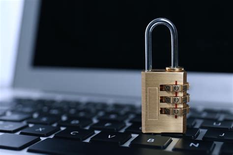 Premium Photo Metal Code Padlock On Laptop Keyboard Space For Text
