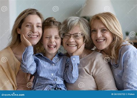Happy Faces Of Multigenerational Women Posing Looking At Camera Stock