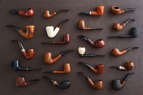 Premium Photo Directly Above Shot Of Smoking Pipes On Table