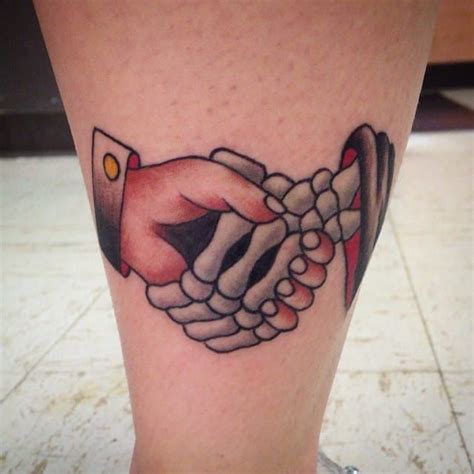 Shaking Hands Tattoo