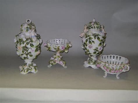 Bonhams A Pair Of Sitzendorf Vases And Covers Encrusted With Cherubs