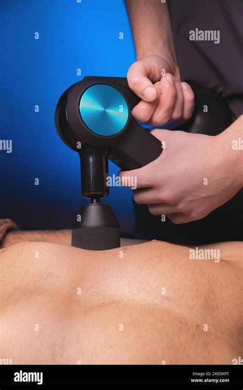 Sports Percussion Massage In The Medical Office Of The Gym The Masseur