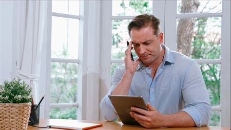 Businessman Struggle To Solve Work Problem From Home Synchronos Stock
