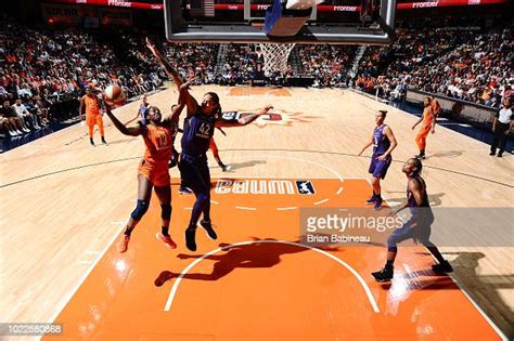 Chiney Ogwumike Of The Connecticut Sun Goes To The Basket Against The