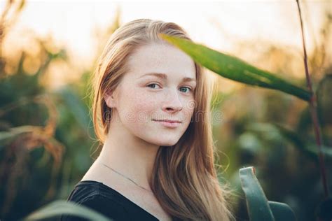 Outdoors Lifestyle Portrait Of Young Adorable Fresh Looking Redhead