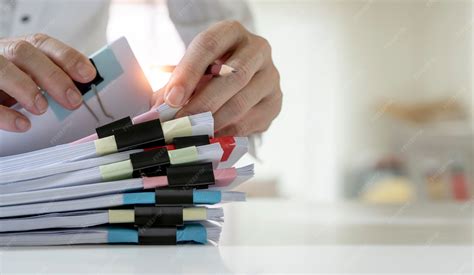 Premium Photo Businessman Hands Working On Stacks Of Paperwork For On