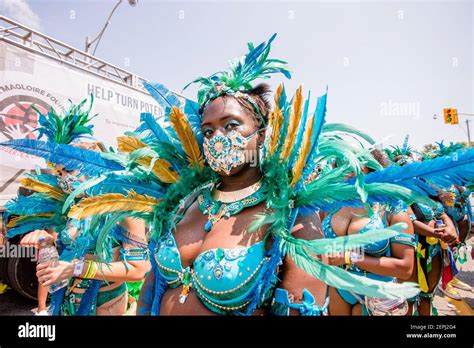 A Participant Parading In A Colourful Costume During The Toronto