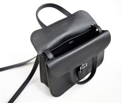 The Hermes Mini Halzan Feather Factor