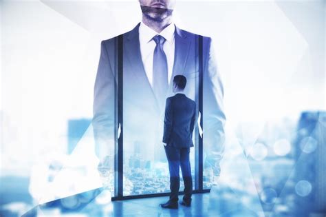 Premium Photo Double Exposure Of Two Businessman Standing In Office