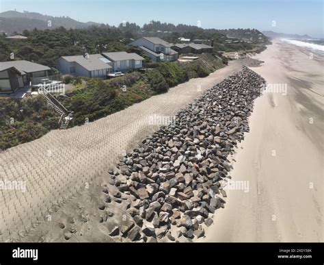 Beach Erosion Mitigation Restoration And Riprap Construction At