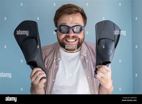 Satisfied Smiling Man In Anticipation Of A Vacation He Put On