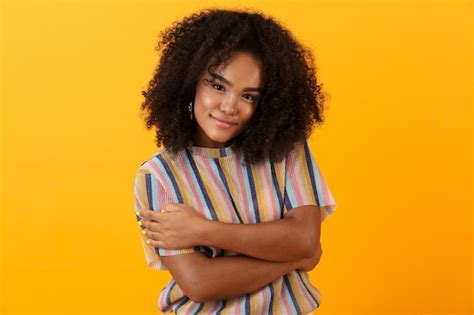 Premium Photo Cute Woman Posing Isolated Over Yellow Wall
