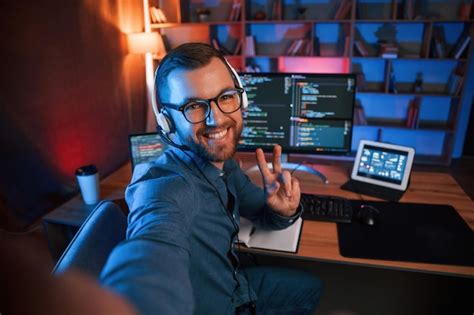 Premium Photo Professional Programmer Is Working Indoors Neon Lighting