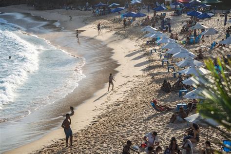 Premium Photo People Having Fun On The Sands Of Paciencia Beach