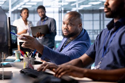 teamworking engineers in data center using diagnostic tools and system