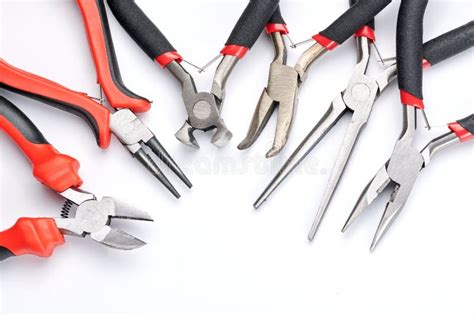 Set Of Different Types Of Pliers And Side Cutters Isolated On White