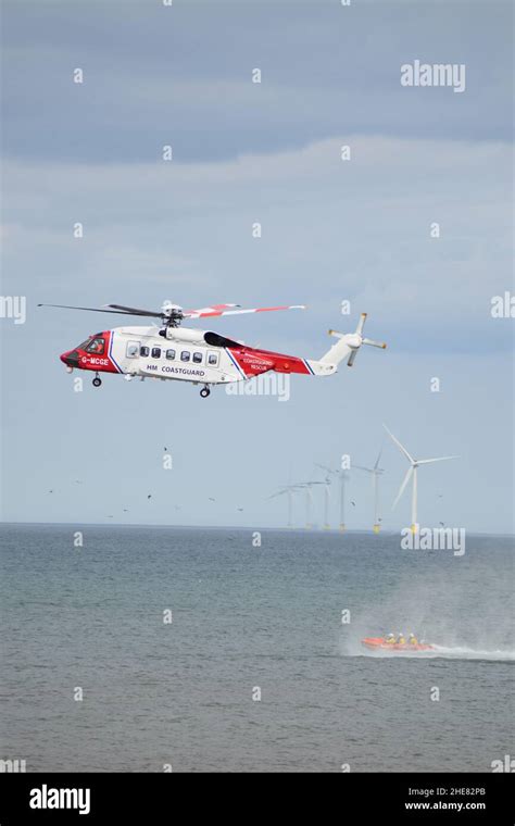 Uk Hm Coastguard Helicopter In Training Manoeuvres With Rnli Humber