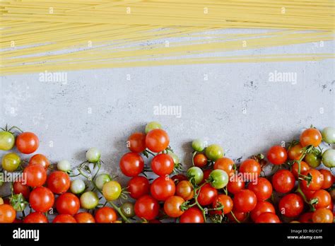 Food Frame Pasta Ingredients Concept Uncooked Spaghetti And Cherry
