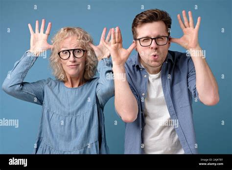 Mature Caucasian Couplemother And Son Teasing Each Other On Blue