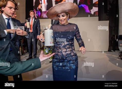 Queen Maxima Drinks Beer From A Giant Beer Mug During The Start Of The Celebration Of 300 Year